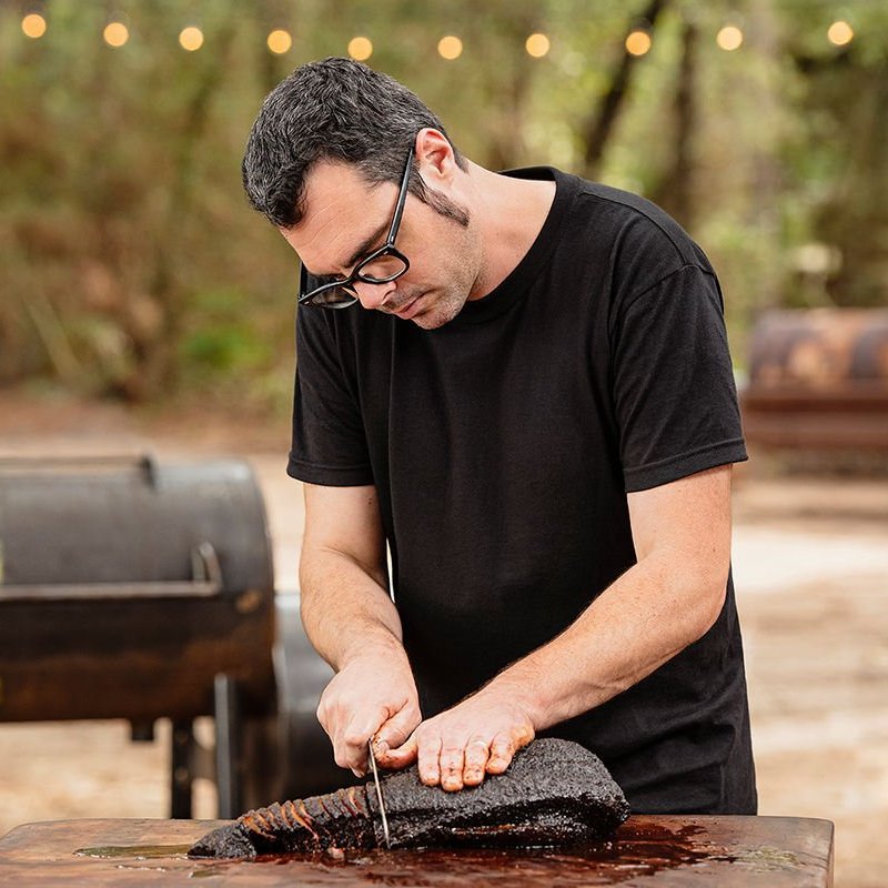 Does Aaron Franklin use mustard on his brisket?