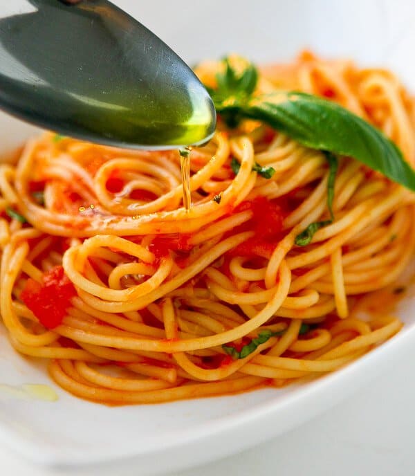 Does basil belong in spaghetti sauce?