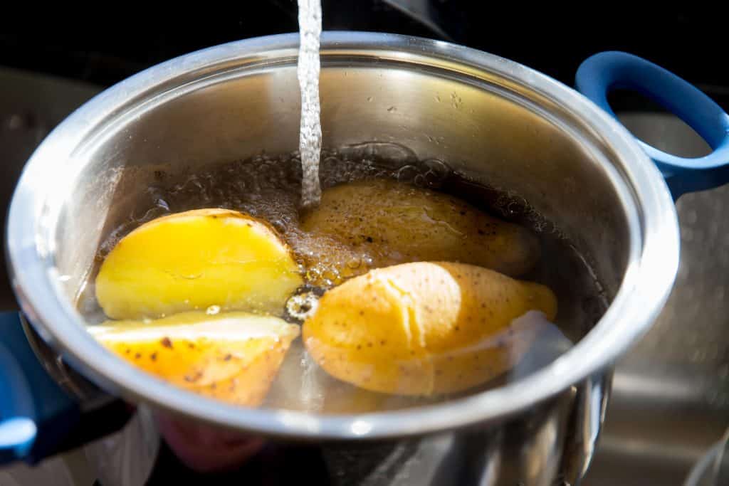 Does boiling potatoes remove them?