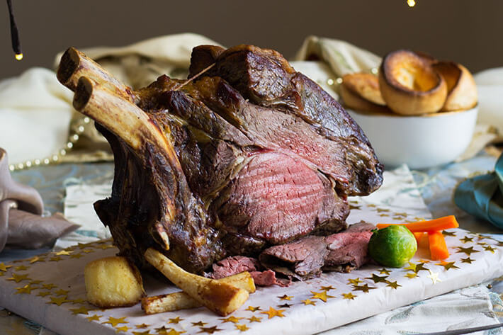 Does bone in beef roast take longer to cook?