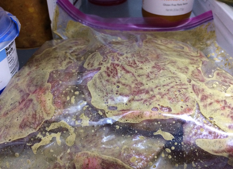 Does meat need to be submerged when marinating?