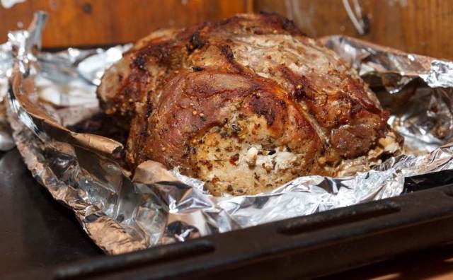 Does wrapping pork butt in tin foil cook faster?