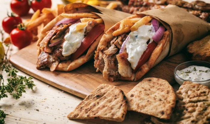 How are gyros served in Greece?