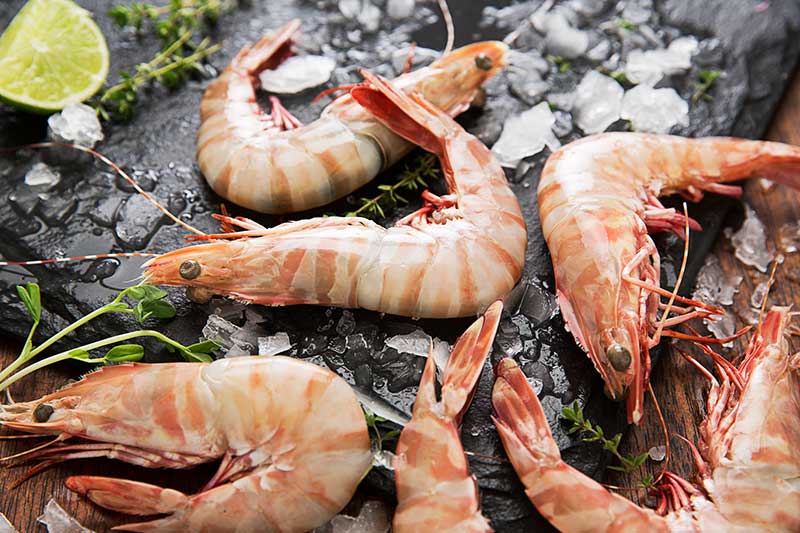 How are prawns graded in Australia?