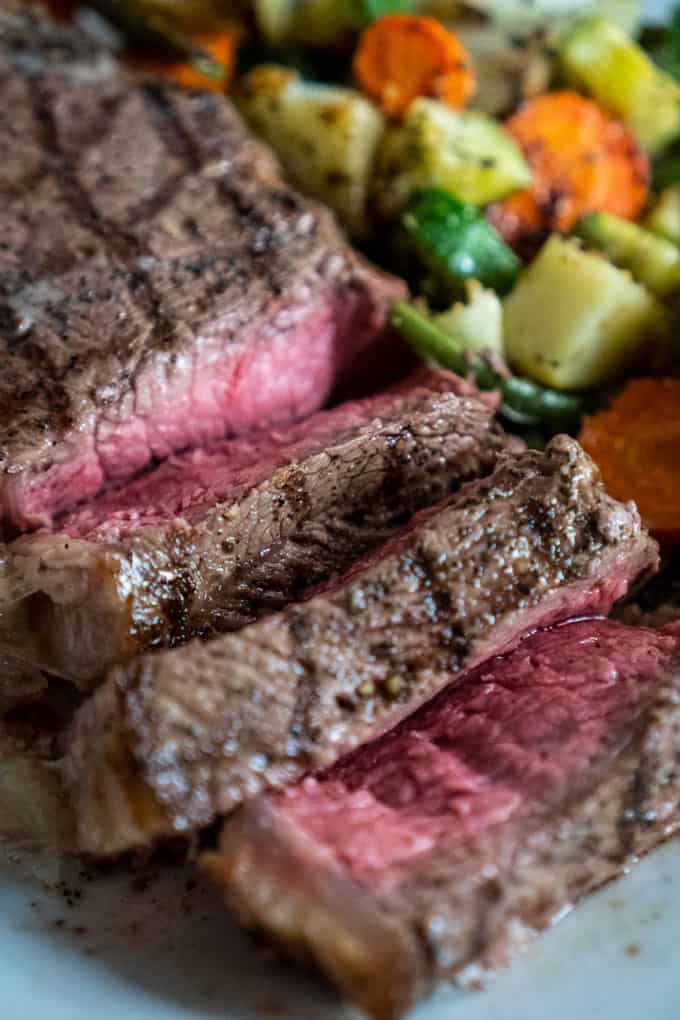 How are steakhouse steaks cooked?