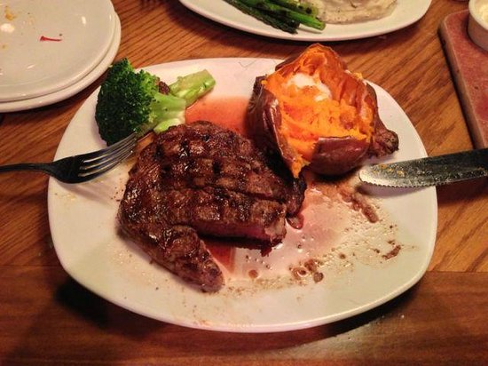 How big is the ribeye at Outback?