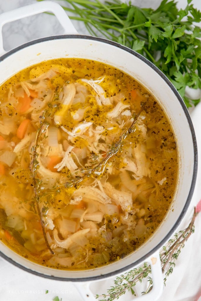 How can I add flavor to homemade chicken soup?