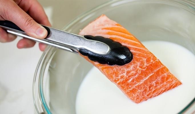 How can I make fish taste better without soaking it in milk?