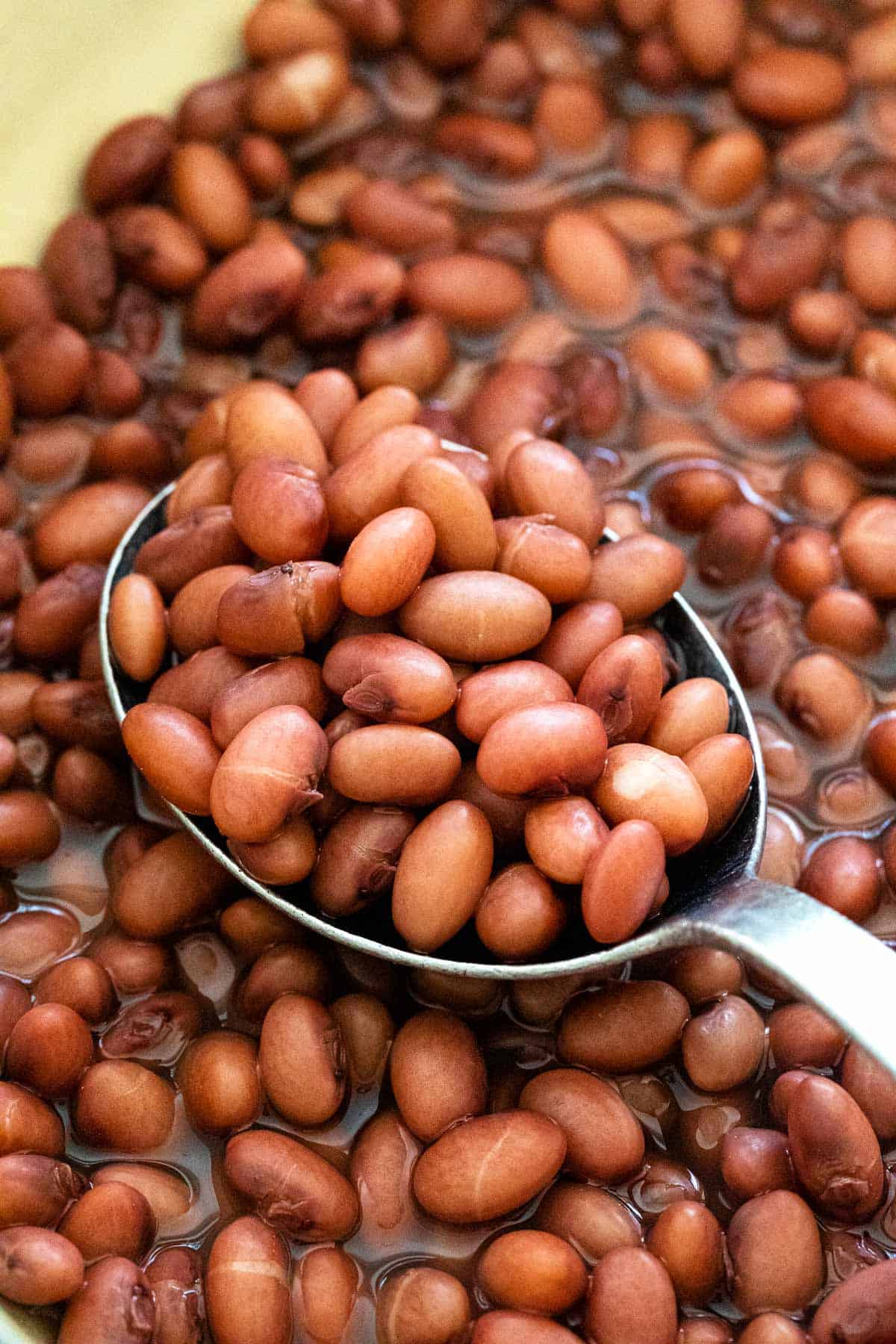 How can I speed up softening beans?