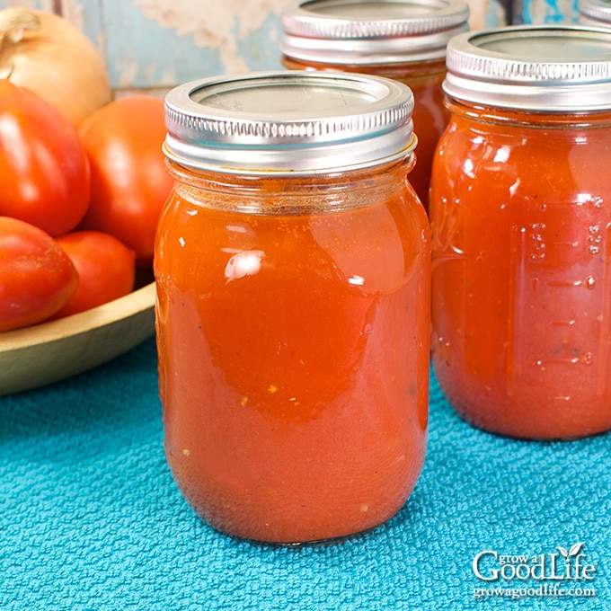 How can I thicken my tomato sauce for canning?