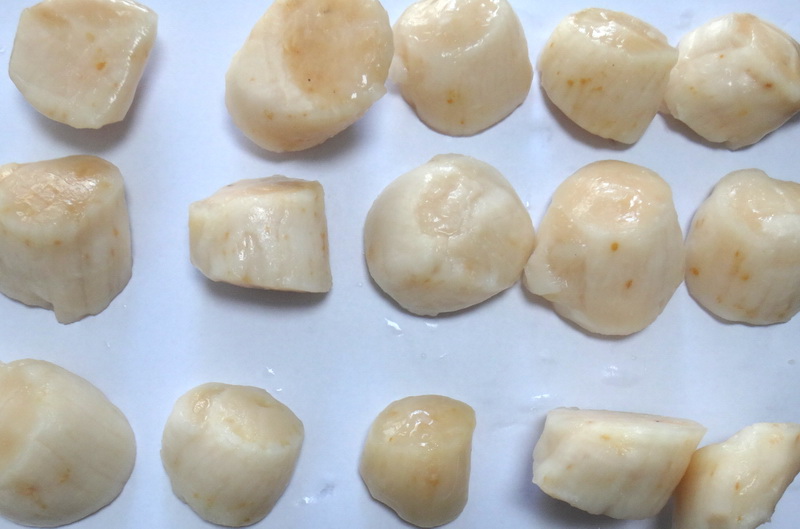 How can you tell if scallops are freezer burned?