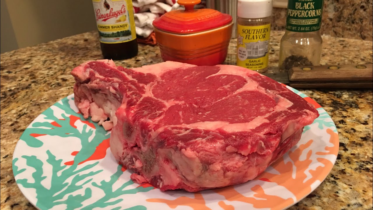 How do I cook a 2 inch thick ribeye?