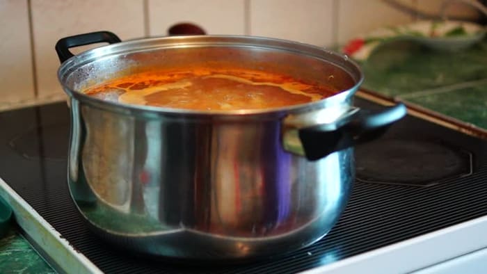 How do I heat soup on the stove?