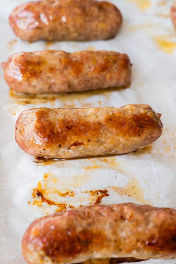 How do I make crispy sausages in the oven?