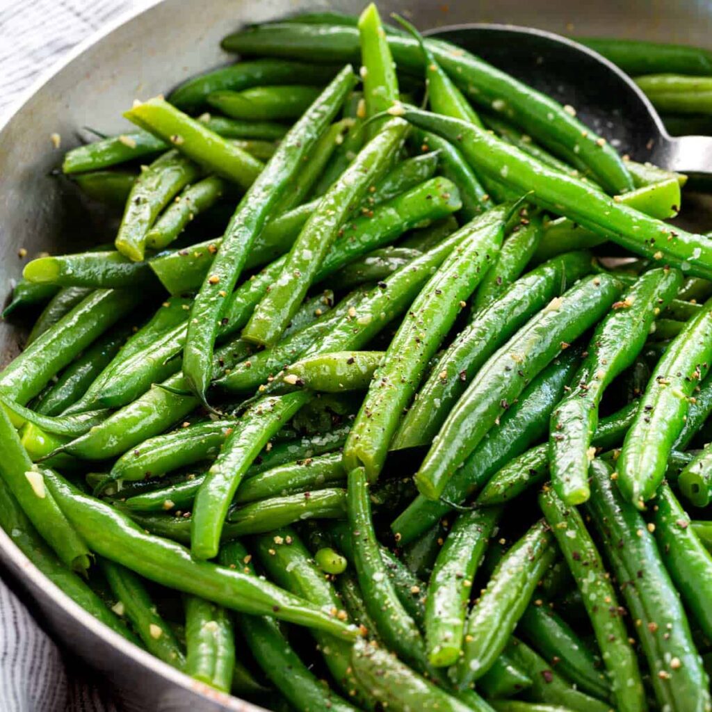 How do I reheat green beans?