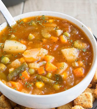 How do I spice up bland vegetable soup?