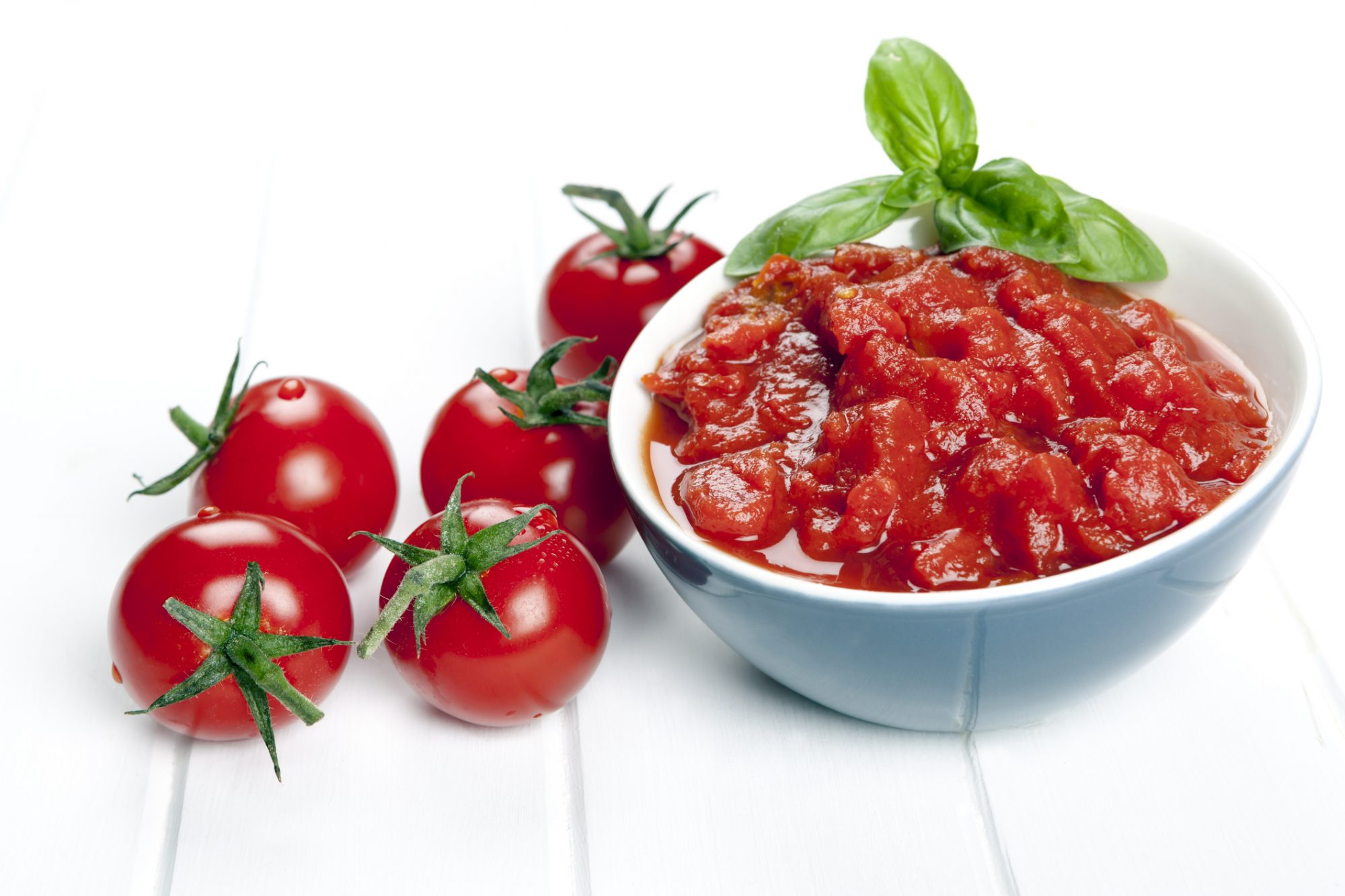 How do I substitute crushed tomatoes for fresh tomatoes?
