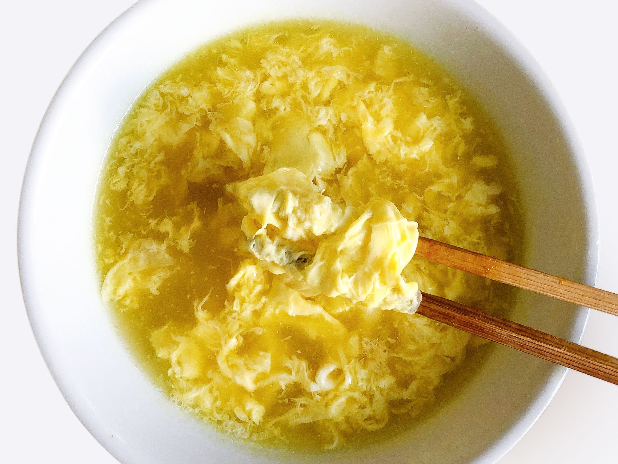 How do you add eggs to soup without cooking?