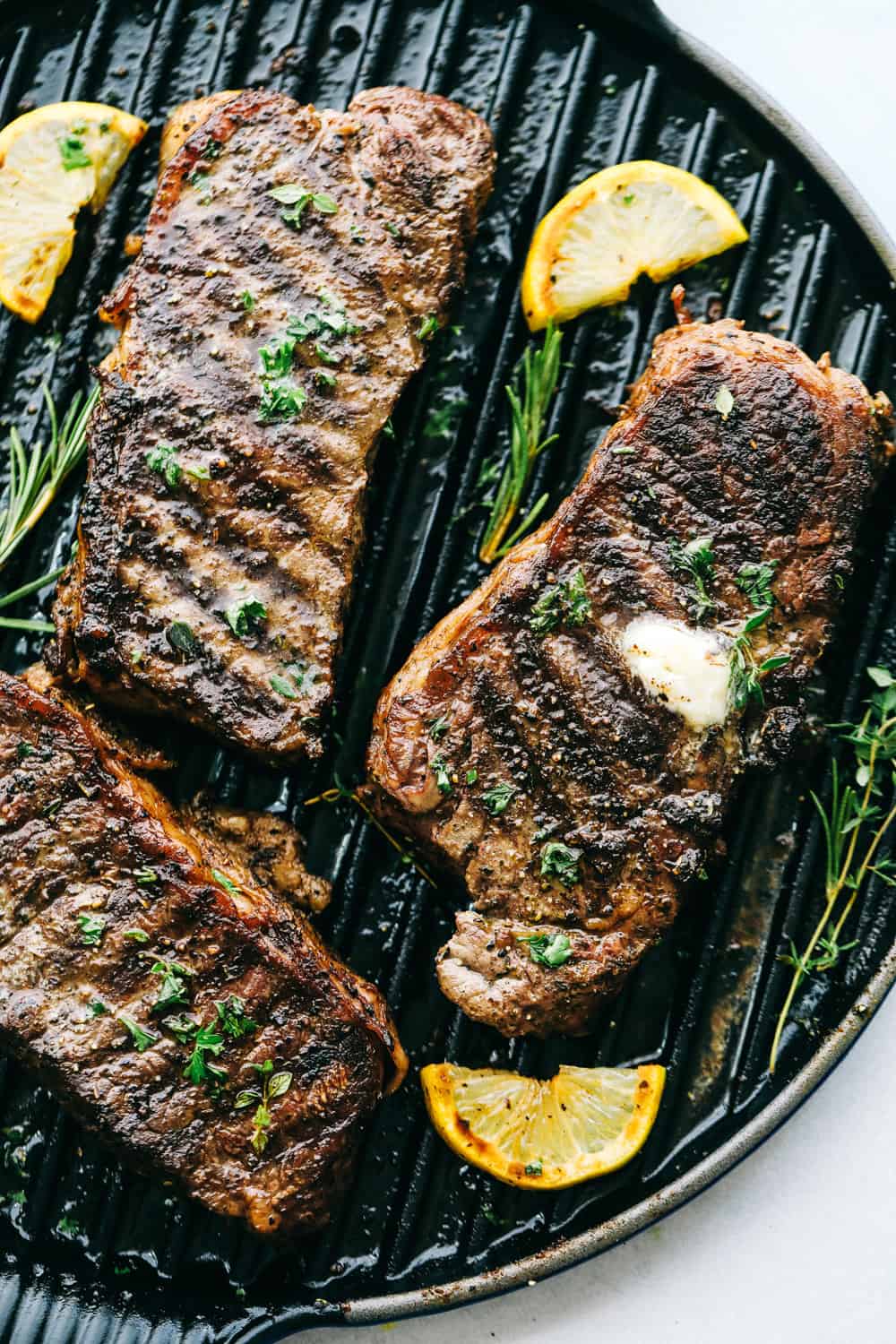 How do you add flavor to grilled steak?