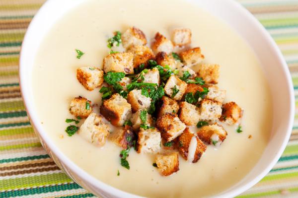 How do you add garlic cloves to soup?