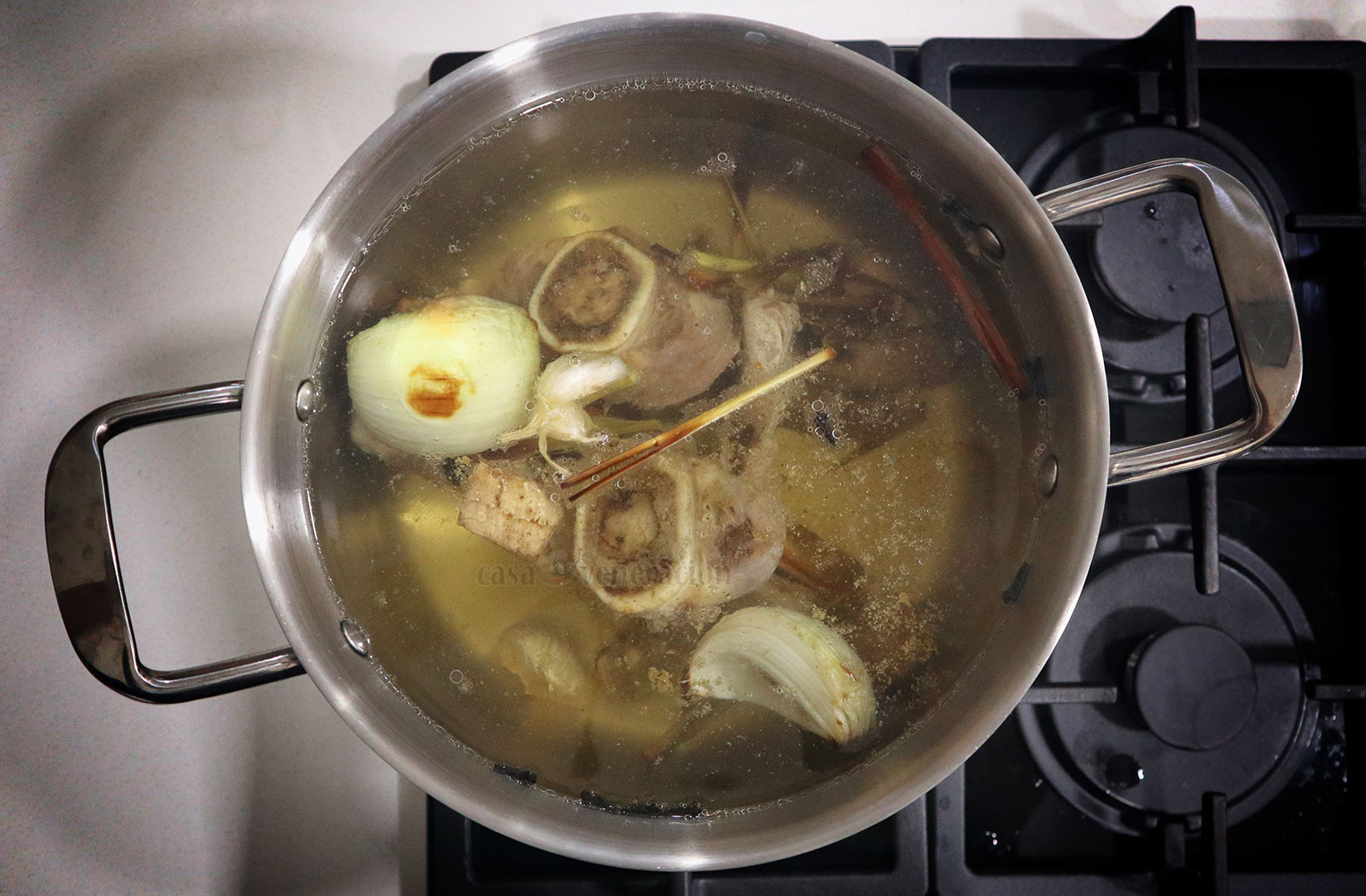 How do you Blanch chicken bones before roasting?