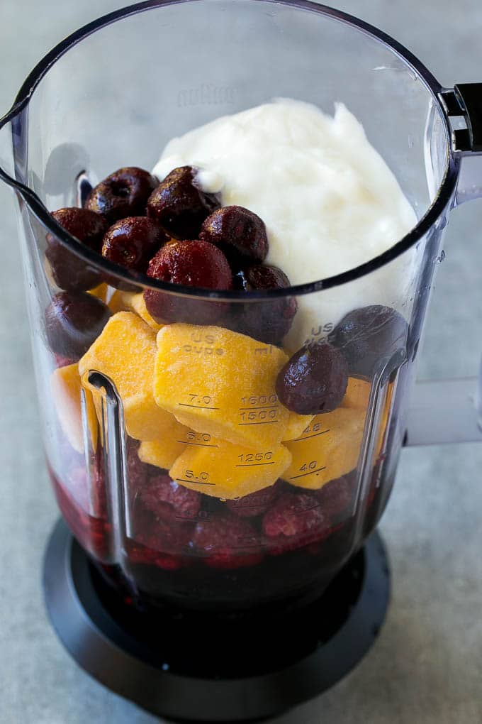 How do you blend frozen fruit in a blender?