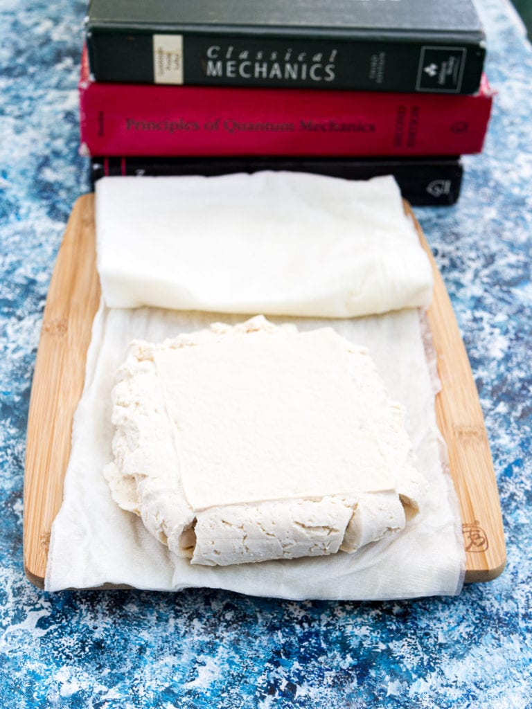 How do you blot tofu without damaging it?