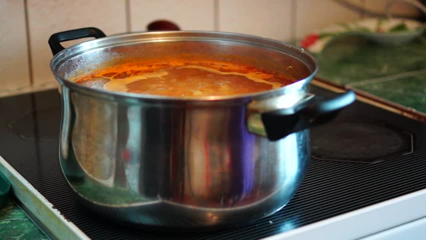 How do you boil soup on the stove?