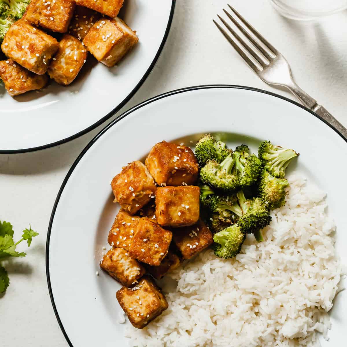 How do you clean a tofu plate after cooking?