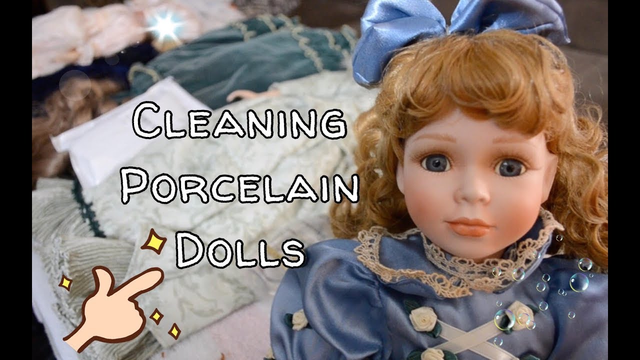 How do you clean an old porcelain doll face?