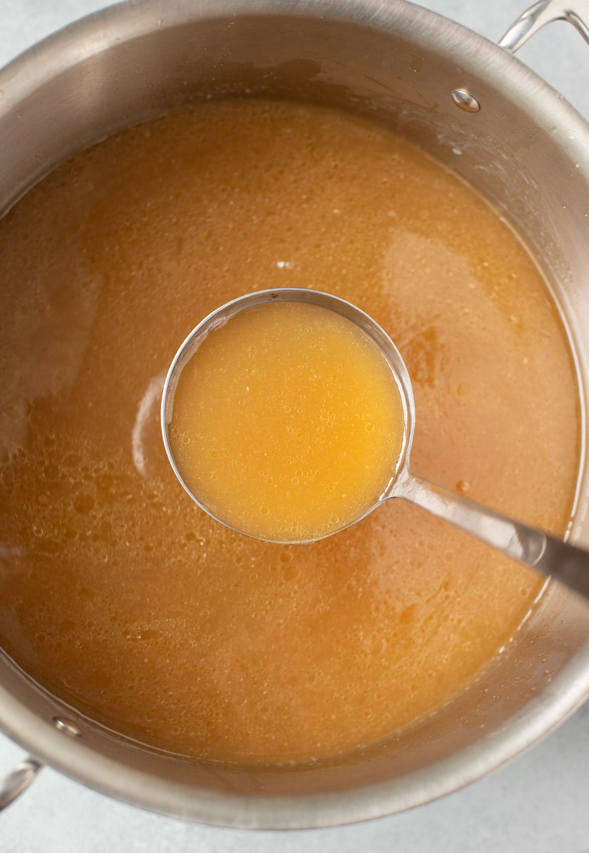 How do you clean chicken broth?