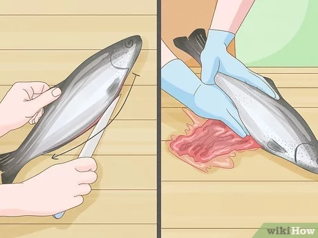 How do you clean fish before cooking with milk?