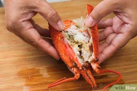How do you clean lobster meat after cooking?