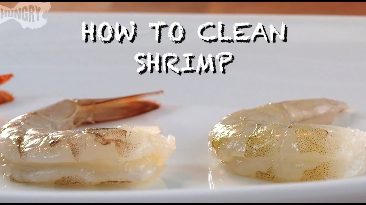 How do you clean raw shrimp before cooking?