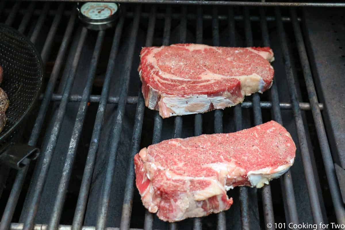 How do you cook a 2 inch ribeye steak on a gas grill?