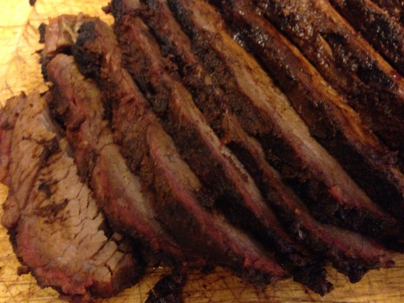 How do you cook a brisket on a BBQ pit without smoking?