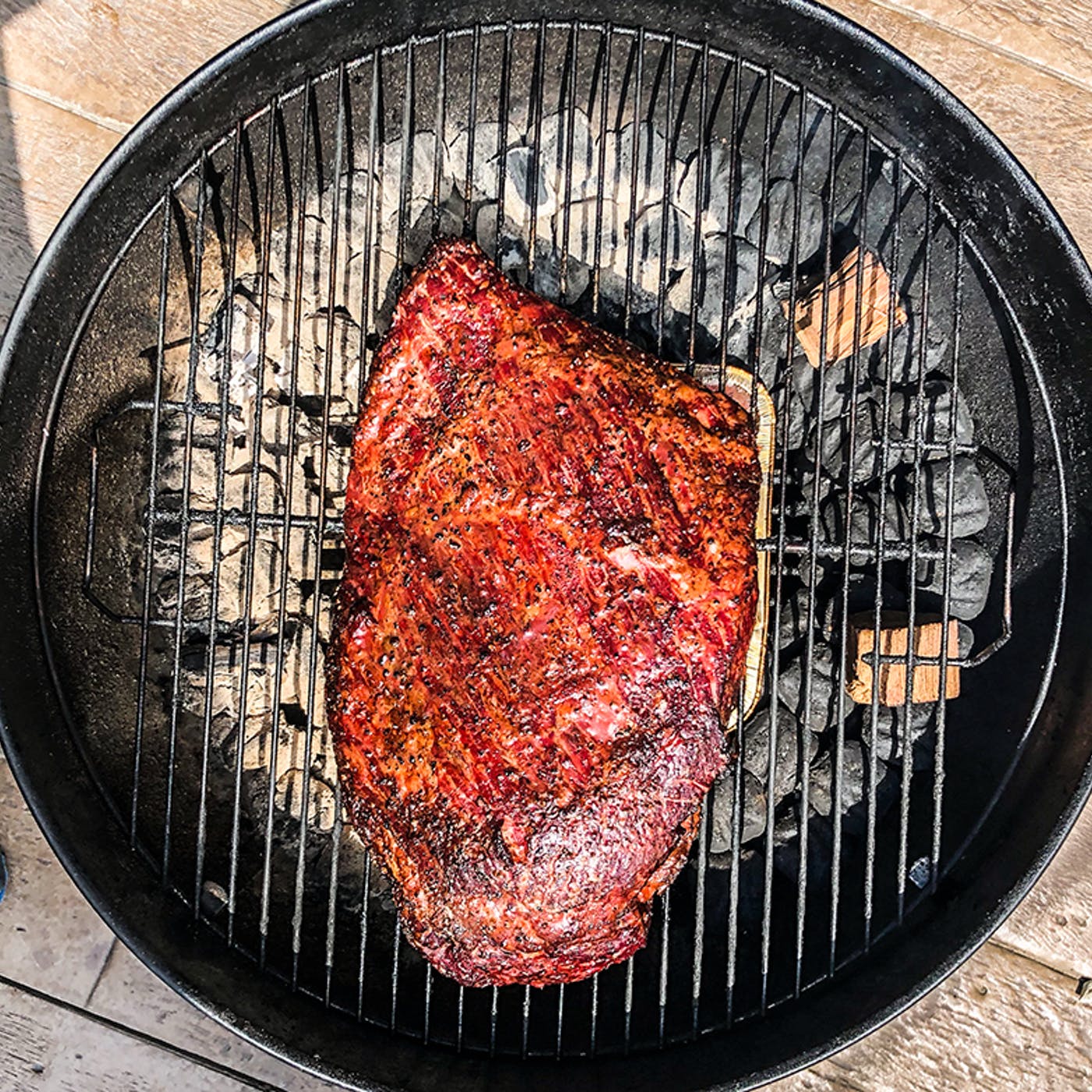 How do you cook a brisket on a charcoal grill?