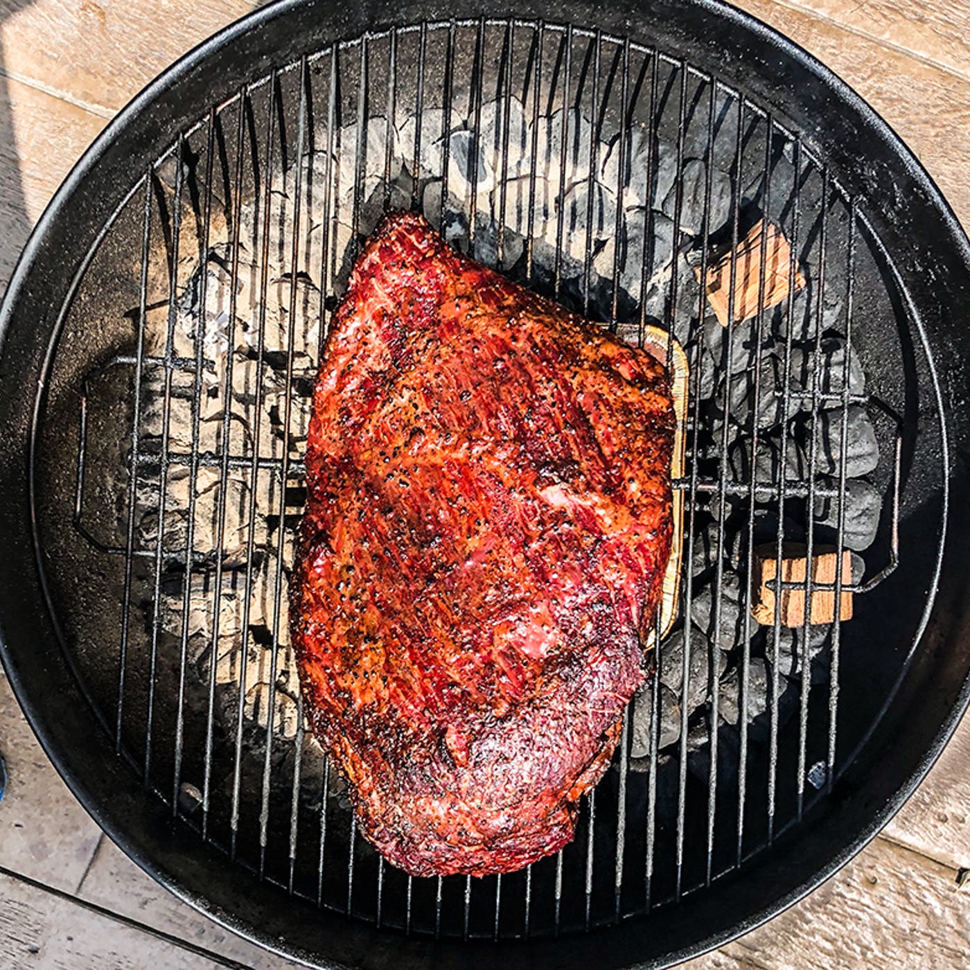 How do you cook a brisket on coal?