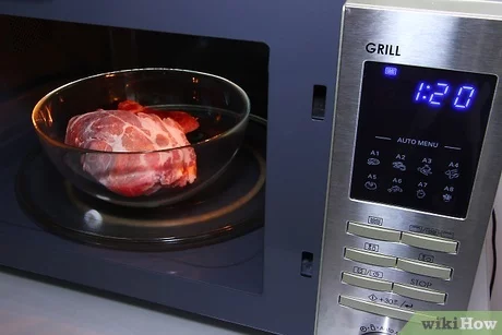 How do you cook frozen meat in the microwave?