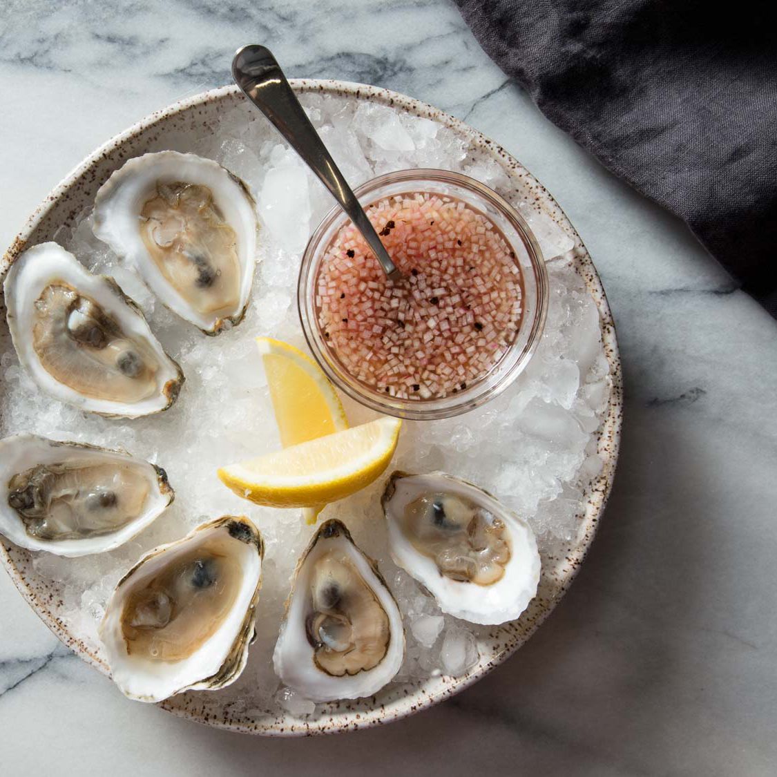 How do you cook raw oysters at home?