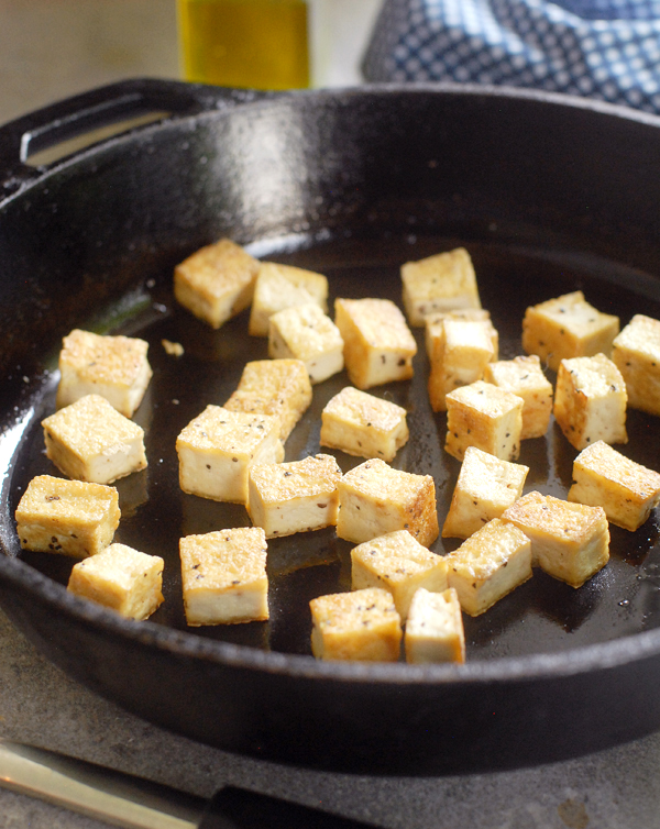 How do you cook tofu on a stainless steel pan without sticking?