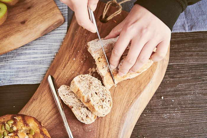 How do you cut bread without crumbling?