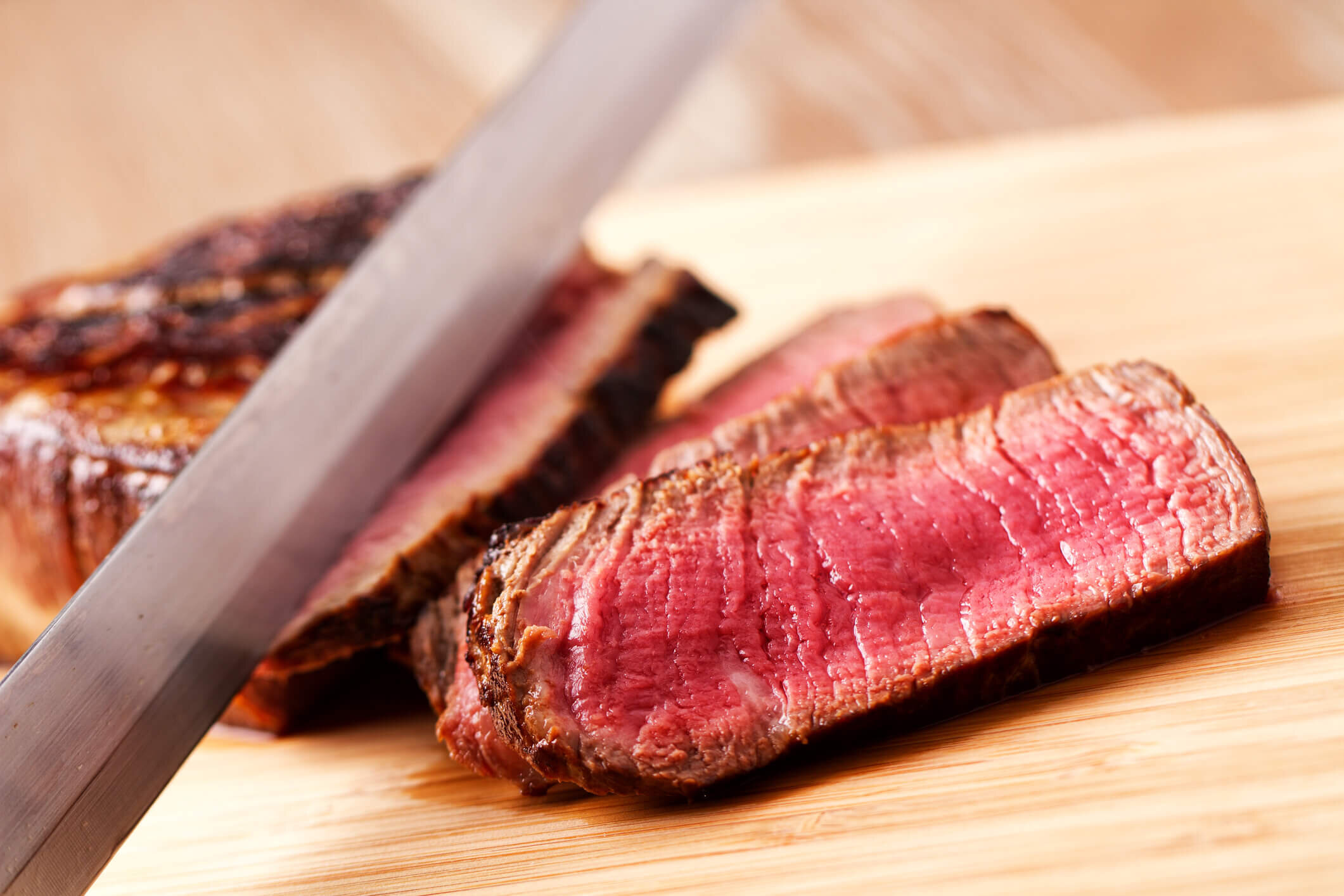 How do you cut meat so it isn't tough?