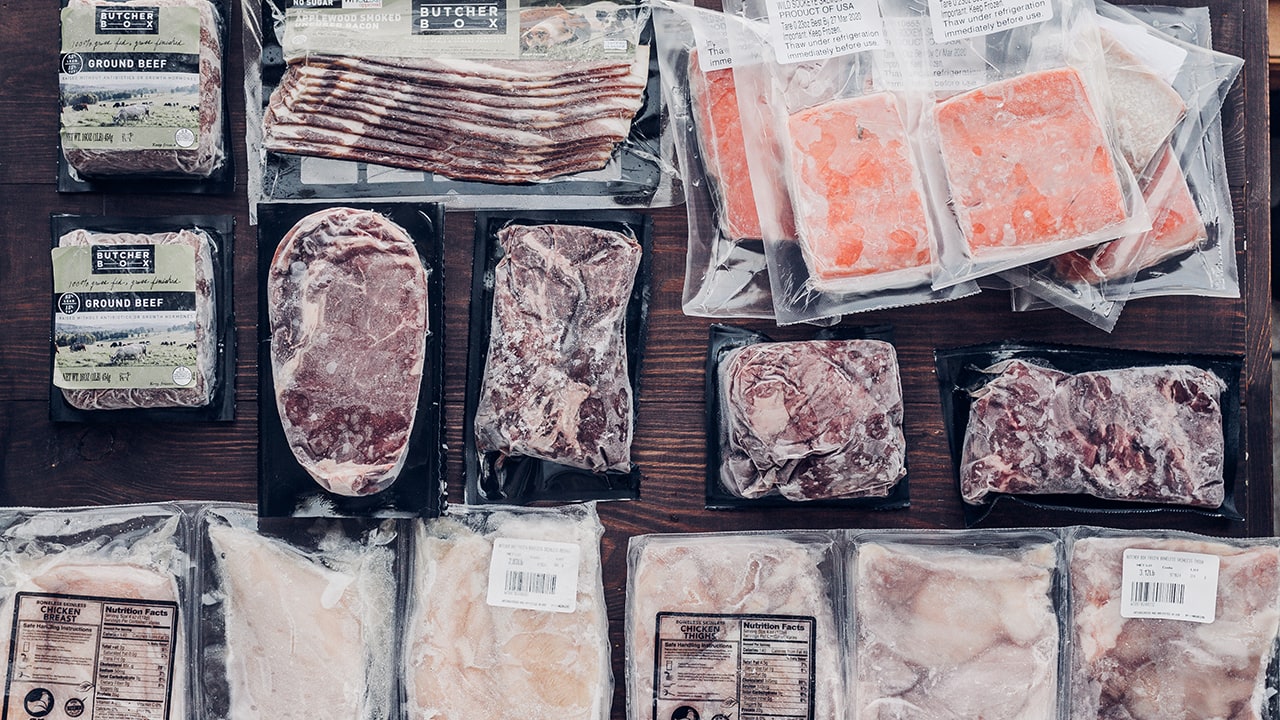 How do you defrost meat in packaging?