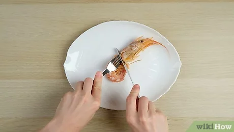 How do you eat a whole prawn?