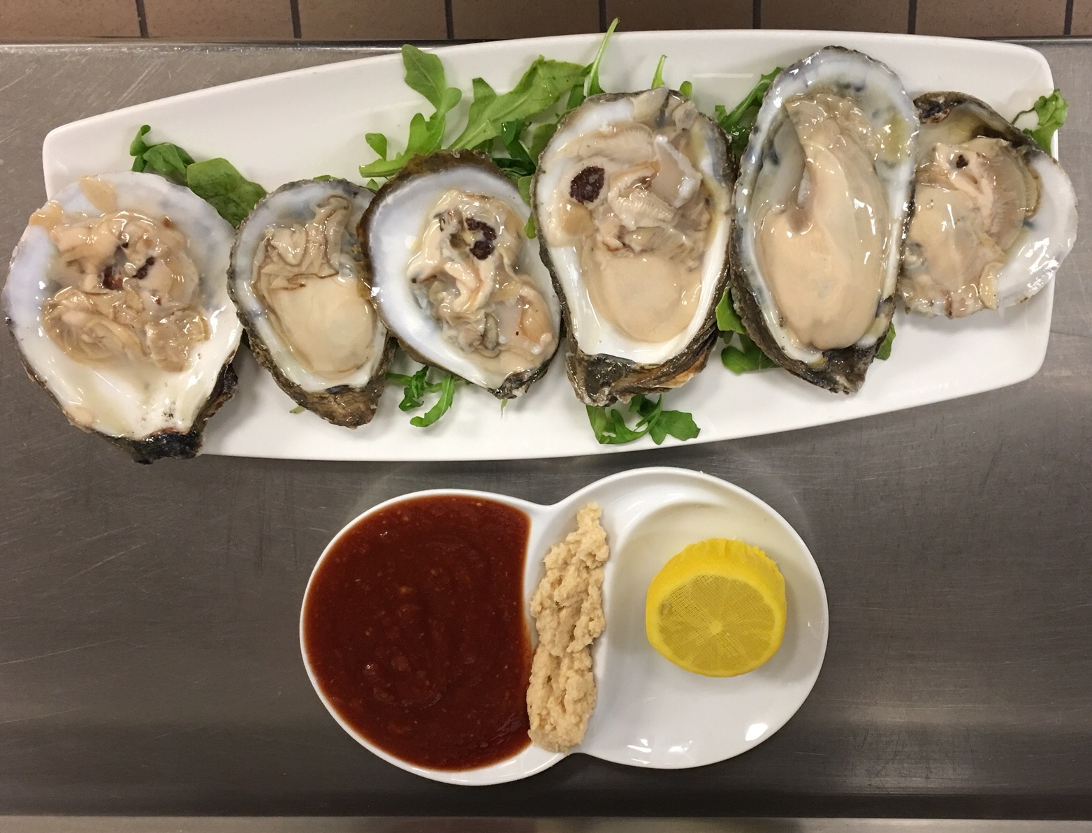 How do you eat oysters on the half shell?
