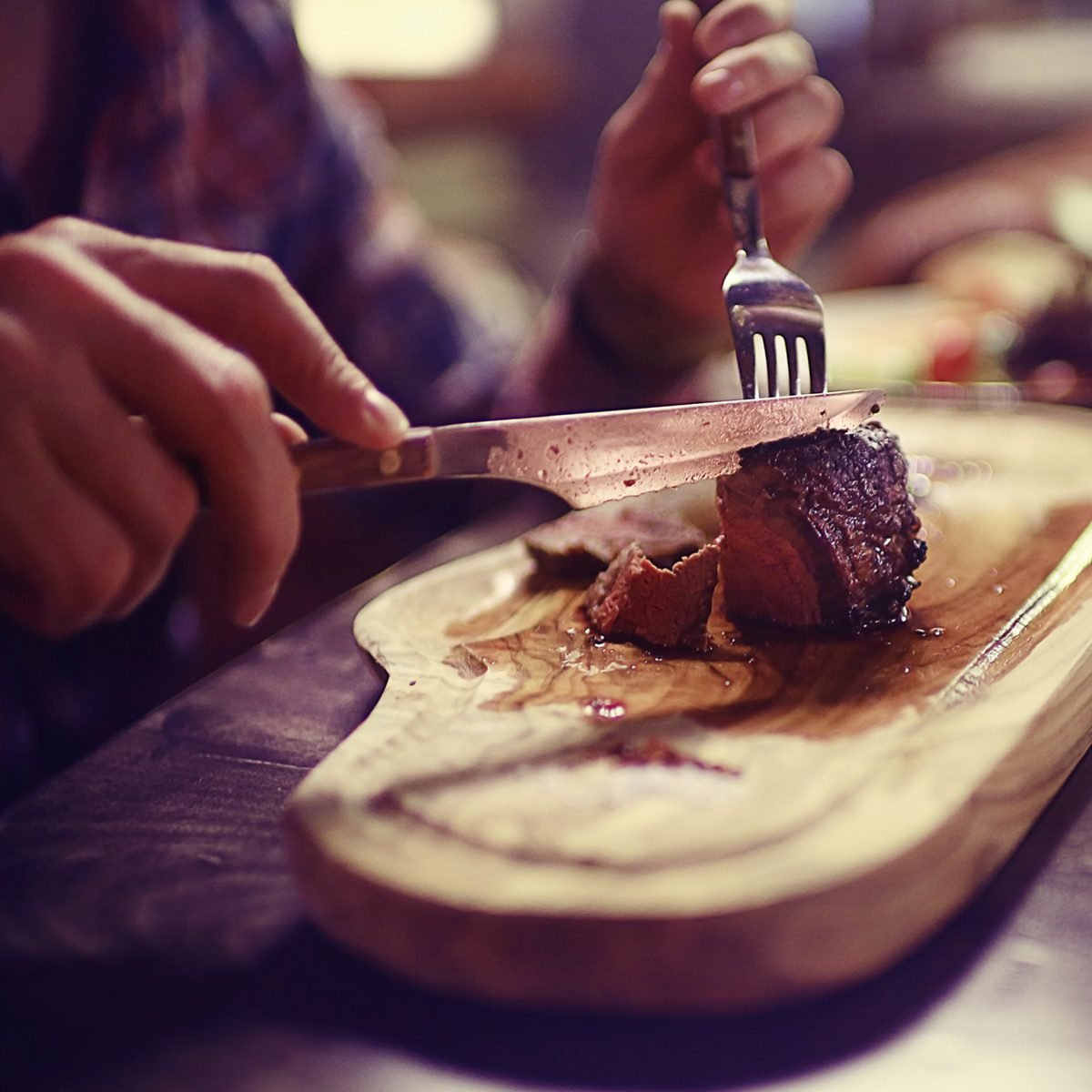 How do you eat steak at a steakhouse?