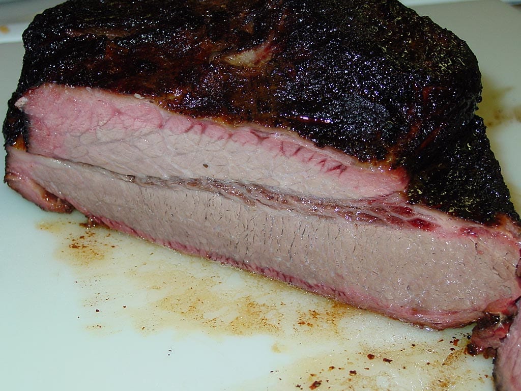 How do you finish a brisket in the oven after smoking?