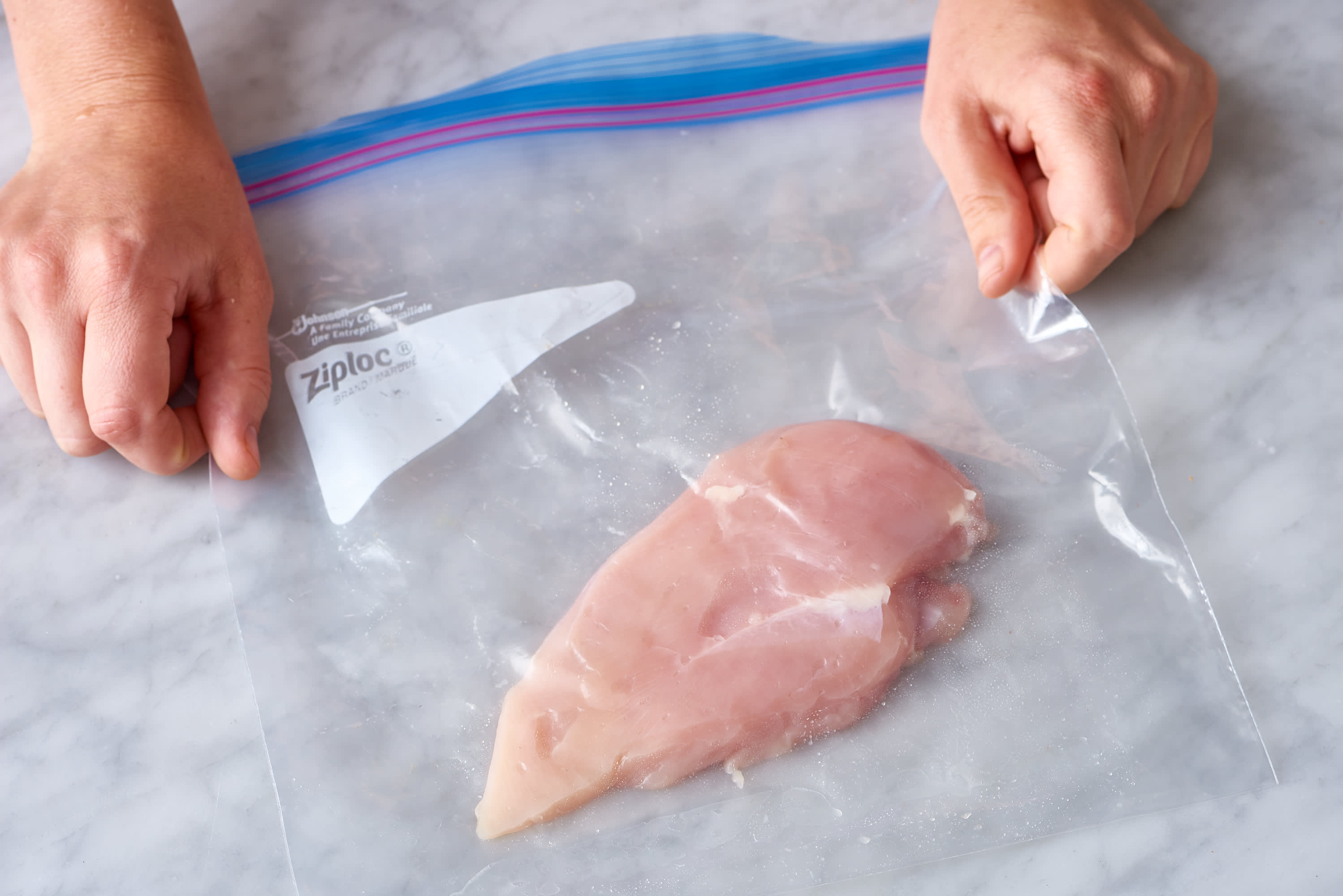 How do you flatten boneless chicken breasts?