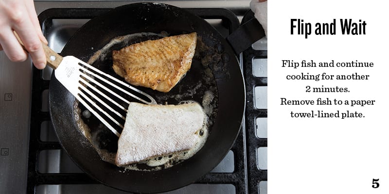 How do you flip fish in a frying pan?